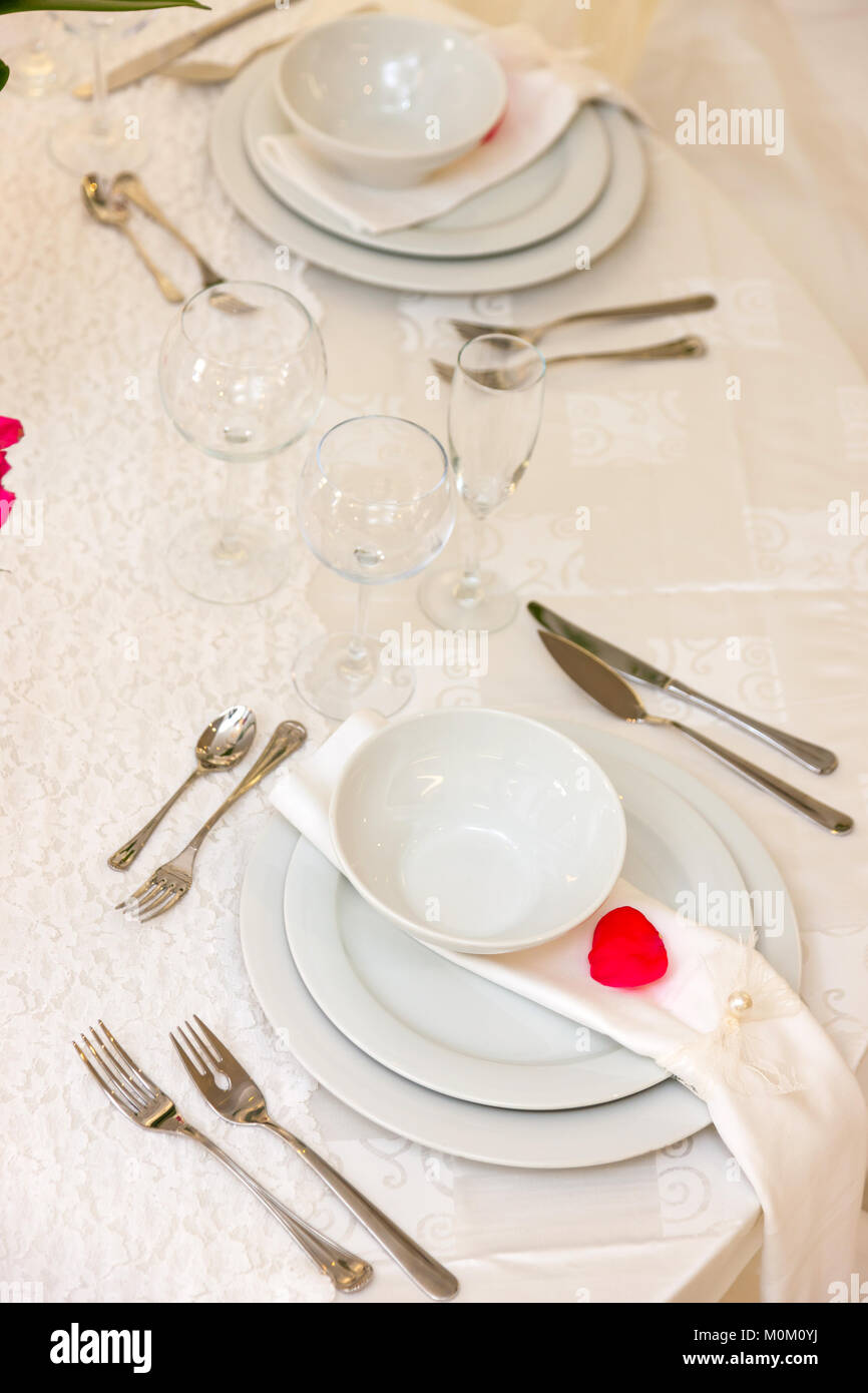 fancy table set for wedding decorated with flowers Stock Photo - Alamy