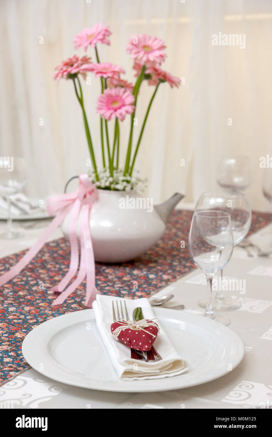 fancy table set for wedding decorated with flowers Stock Photo - Alamy