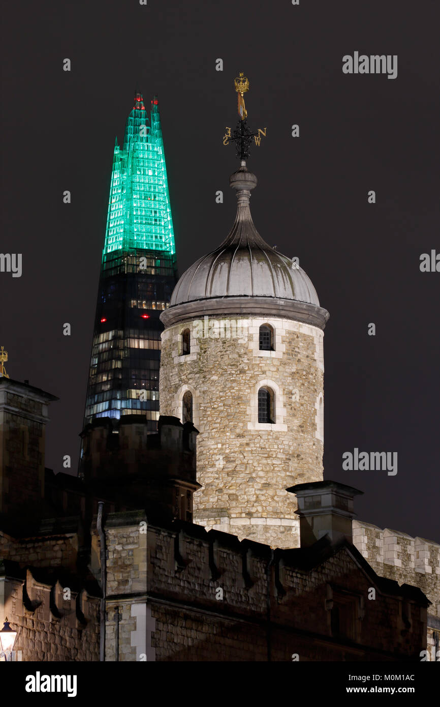 The Tower of London and The Shard, London, at night during the ...