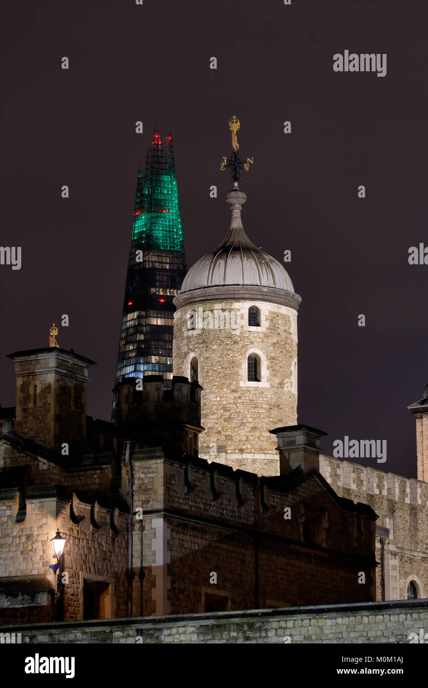 The Tower of London and The Shard, London, at night during the ...