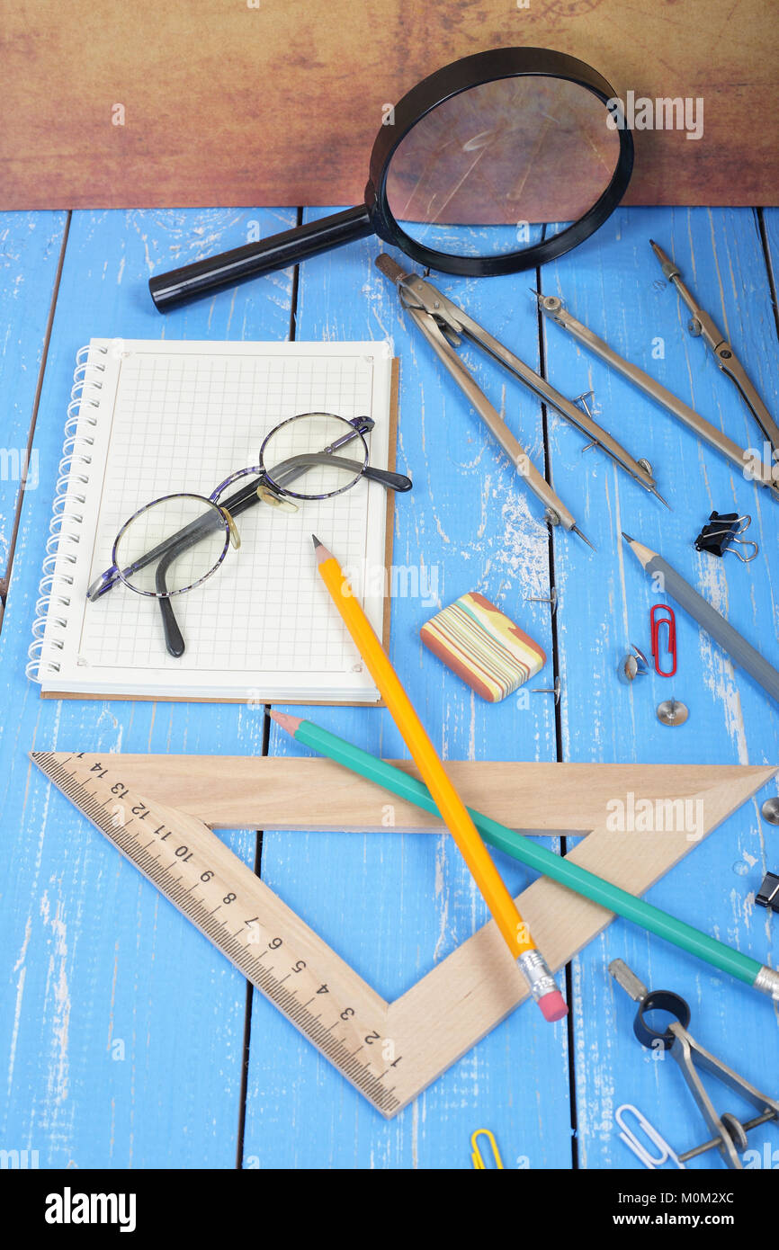 Science and education - Desktop of the scientist objects wood and map ...