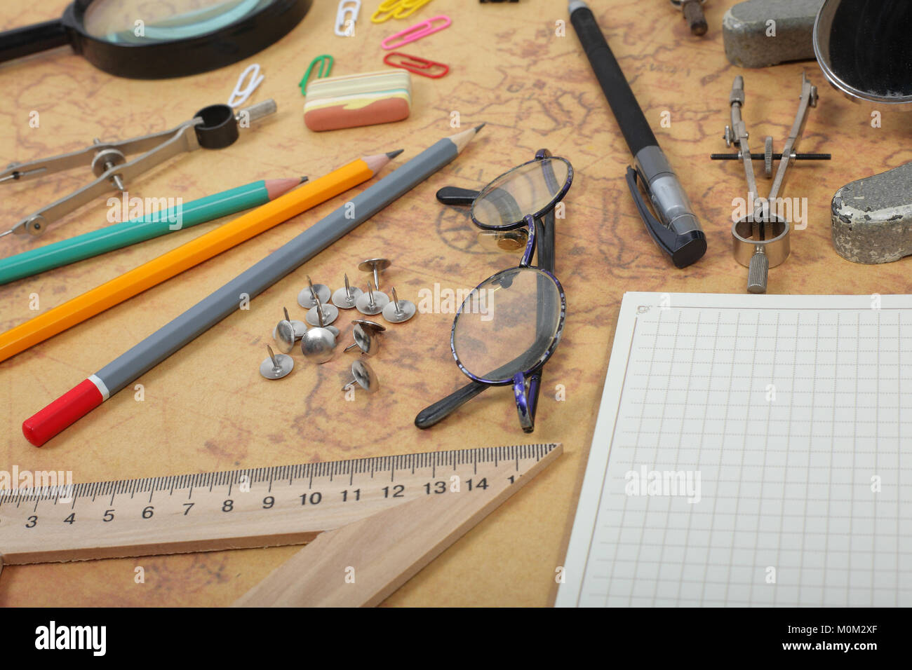 Science and education - Desktop of the scientist objects map background ...