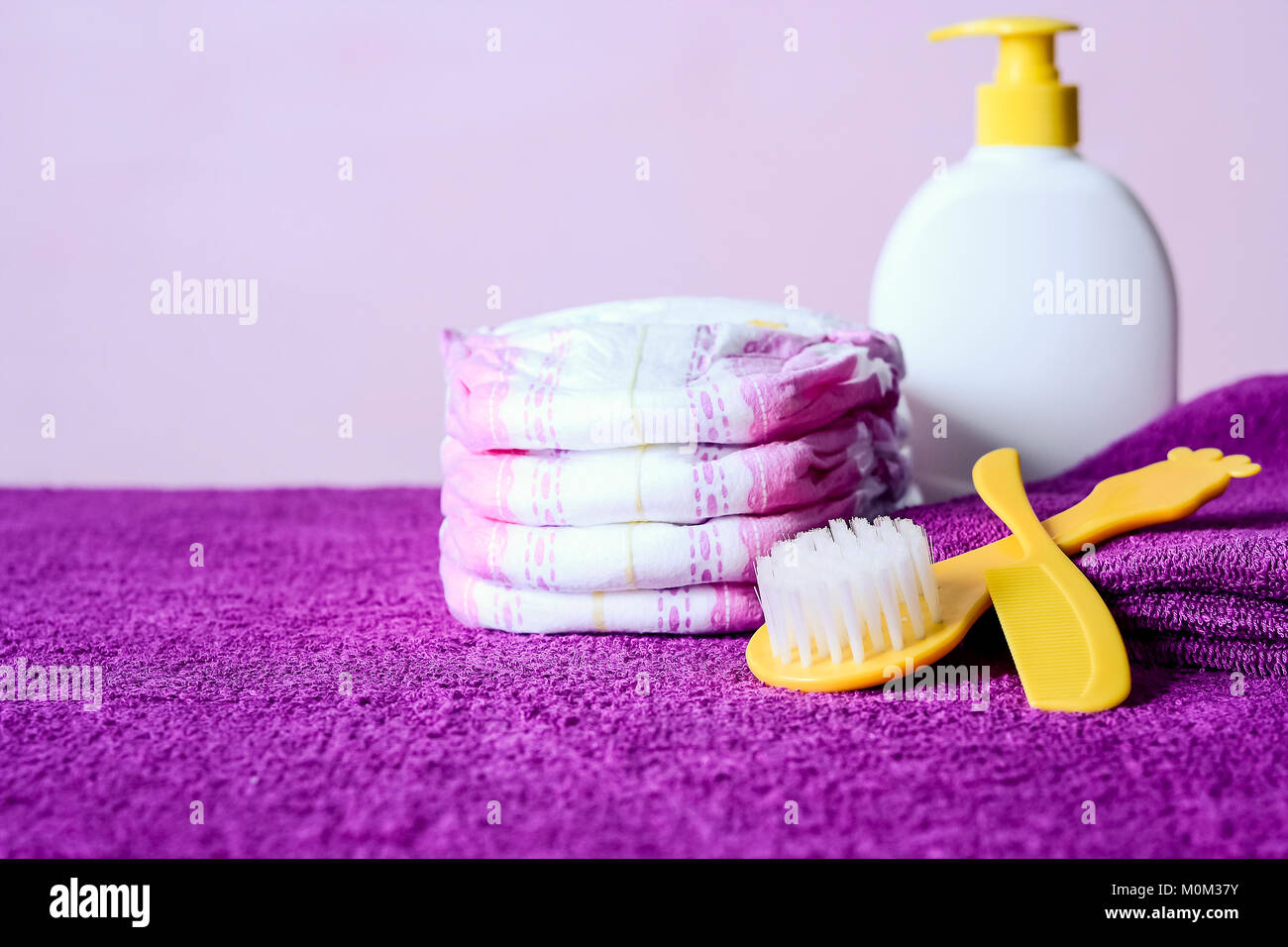 Toiletries and towels lying on the table Stock Photo - Alamy