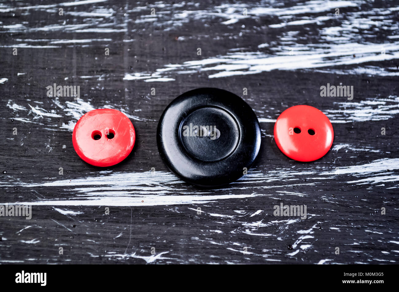 Buttons for clothing and sewing on the table Stock Photo - Alamy