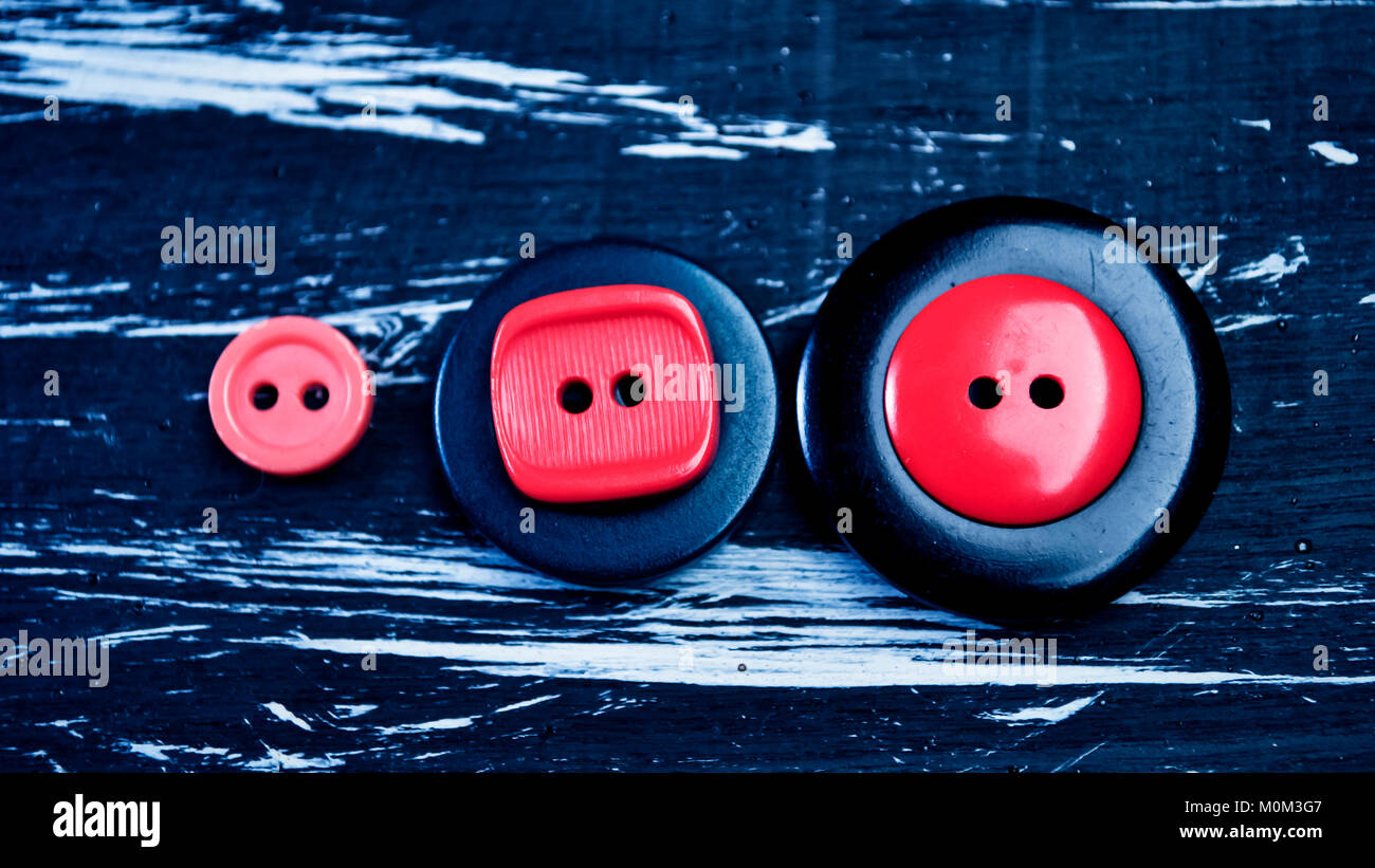 Buttons for clothing and sewing on the table Stock Photo - Alamy