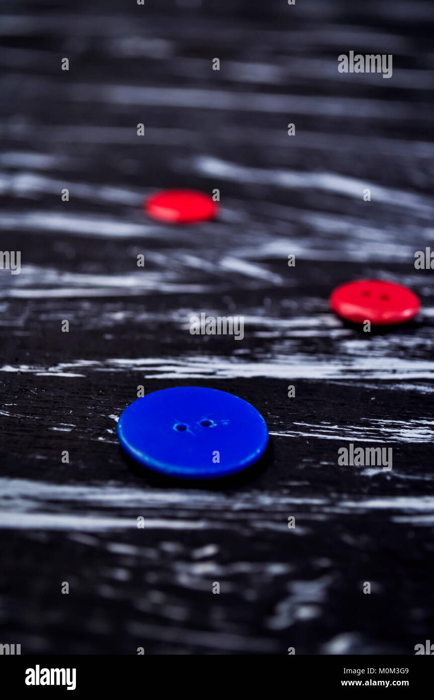 Buttons for clothing and sewing on the table Stock Photo - Alamy