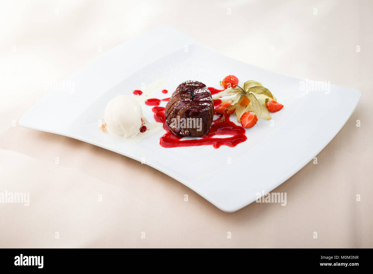Chocolate fondant with ice cream Stock Photo - Alamy