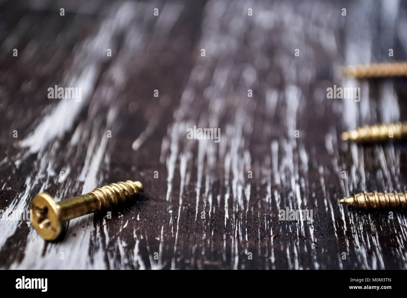 Screws to repair lying on the table Stock Photo - Alamy