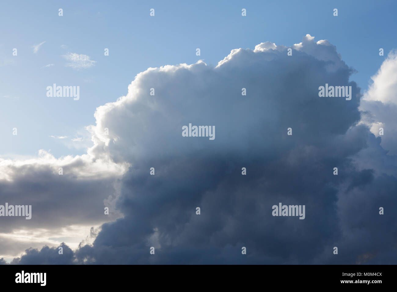 Big cloud on blue sky Stock Photo - Alamy