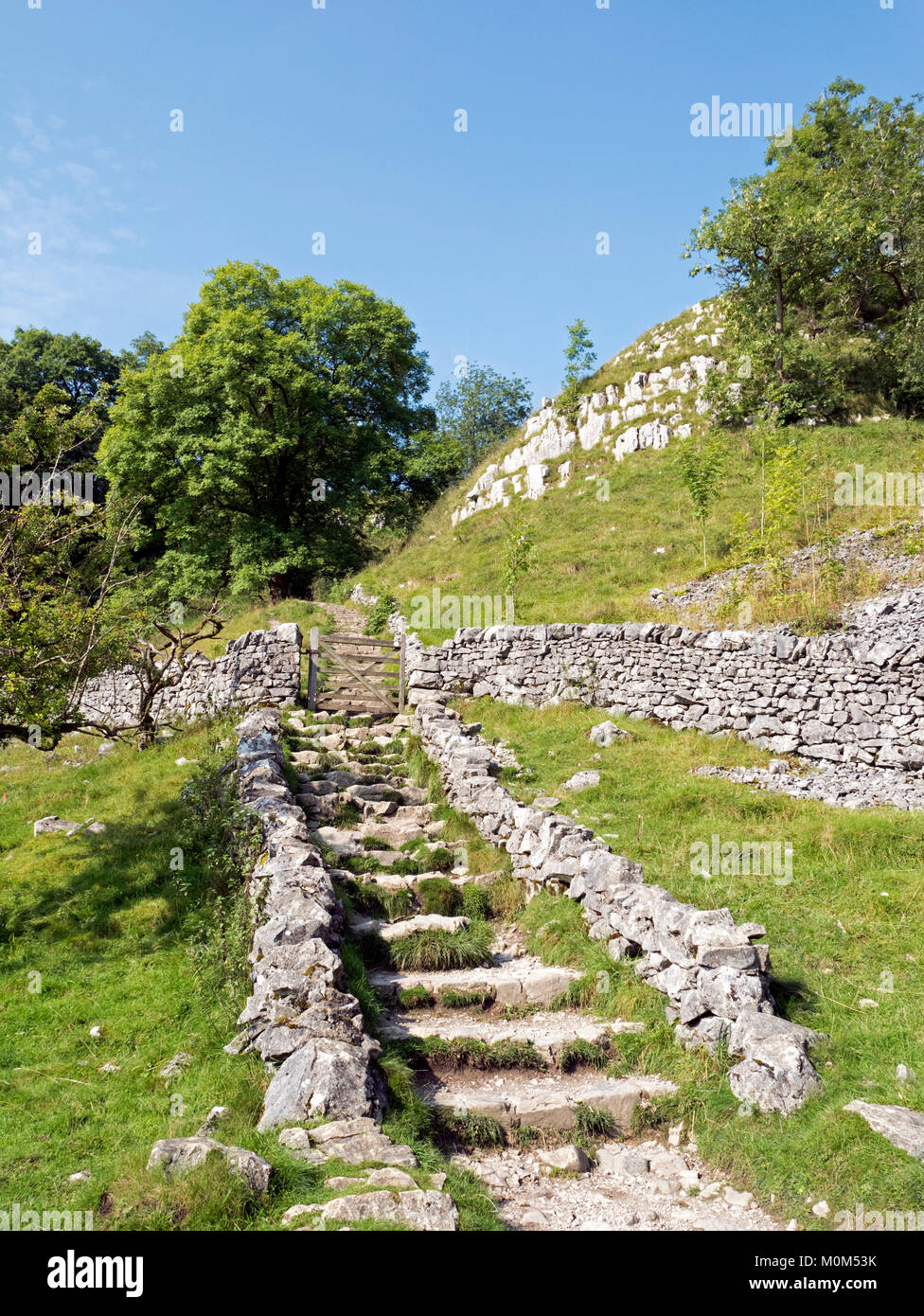 Steps leading from Malham Cove up to limestone pavement, Yorkshie Stock ...