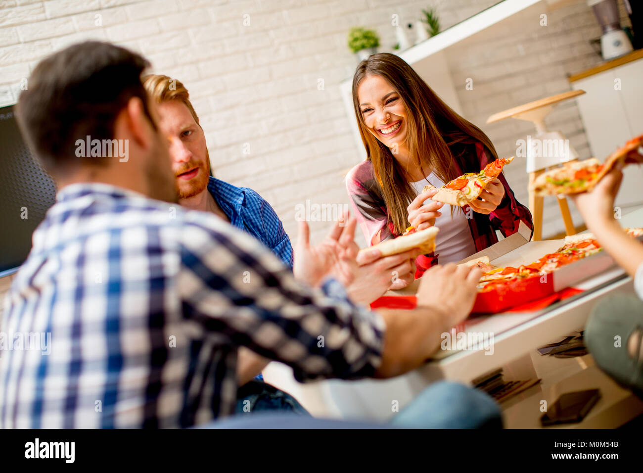 Group women eating pizza home hi-res stock photography and images - Alamy