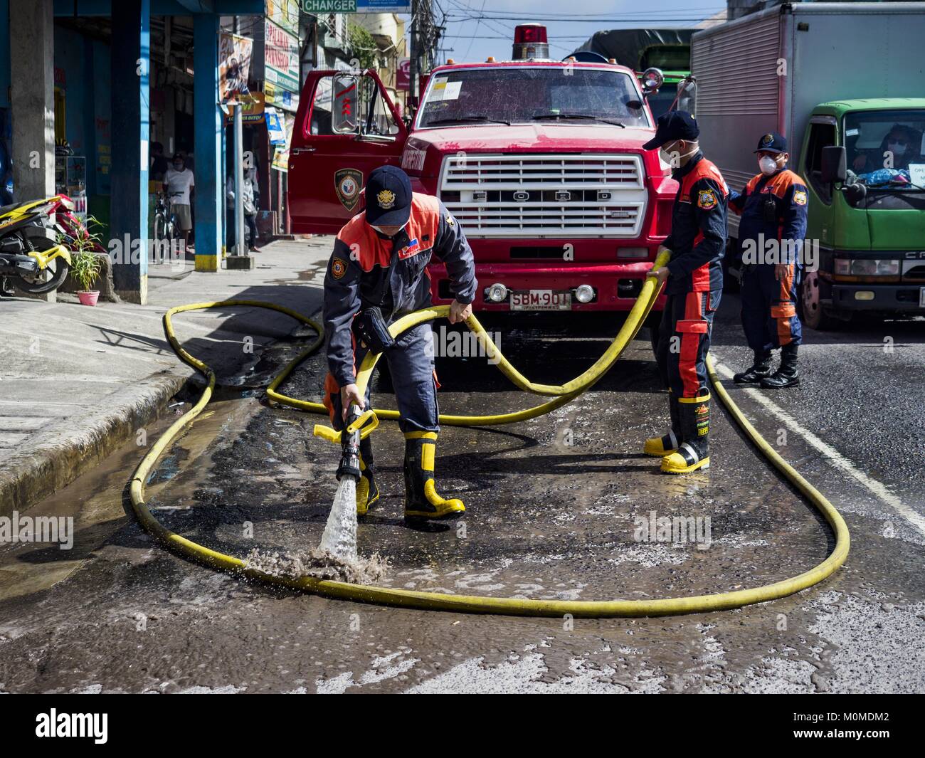 Camalig, Albay, Philippines. 23rd Jan, 2018. A Camalig firefighter ...