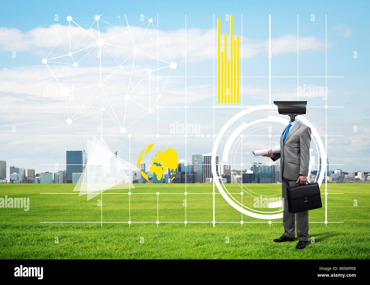 Camera headed man standing on green grass against modern cityscape ...