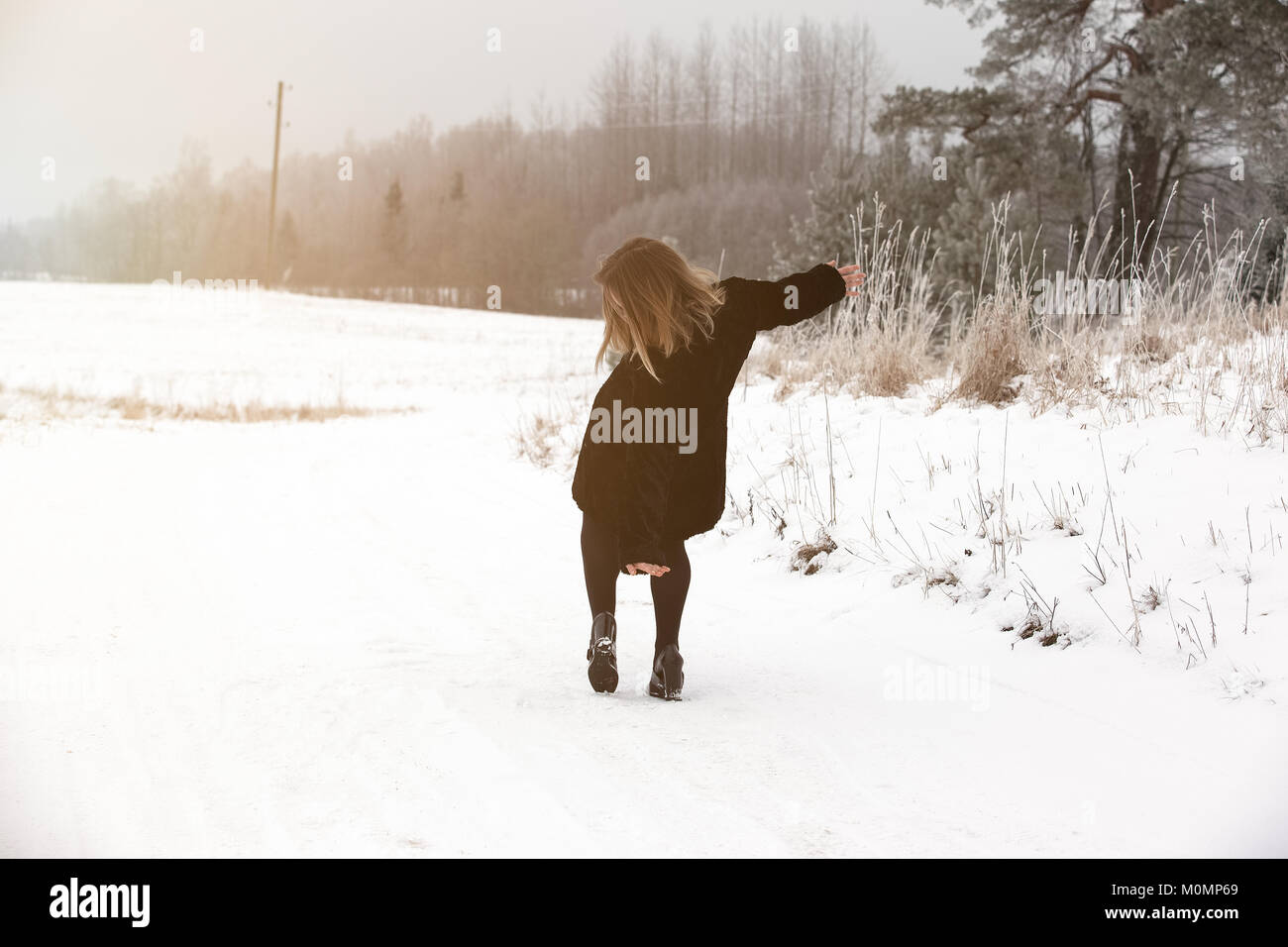 Slip on the slippery ice and snow on the road track at the country in ...