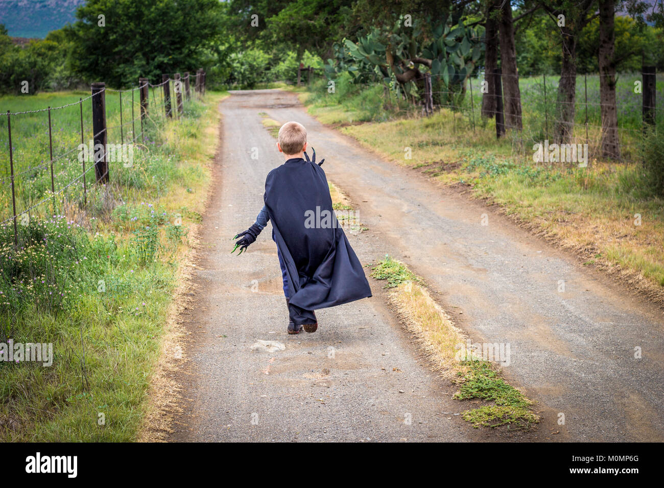 Black cloak hi-res stock photography and images - Alamy