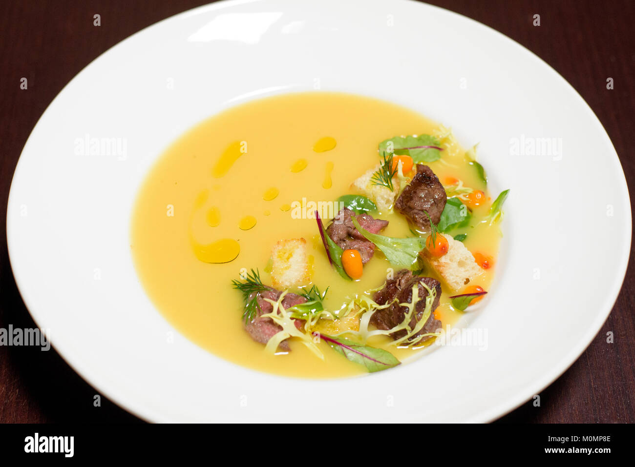 Chef s specialty presented in restaurant on decorated table Stock Photo ...