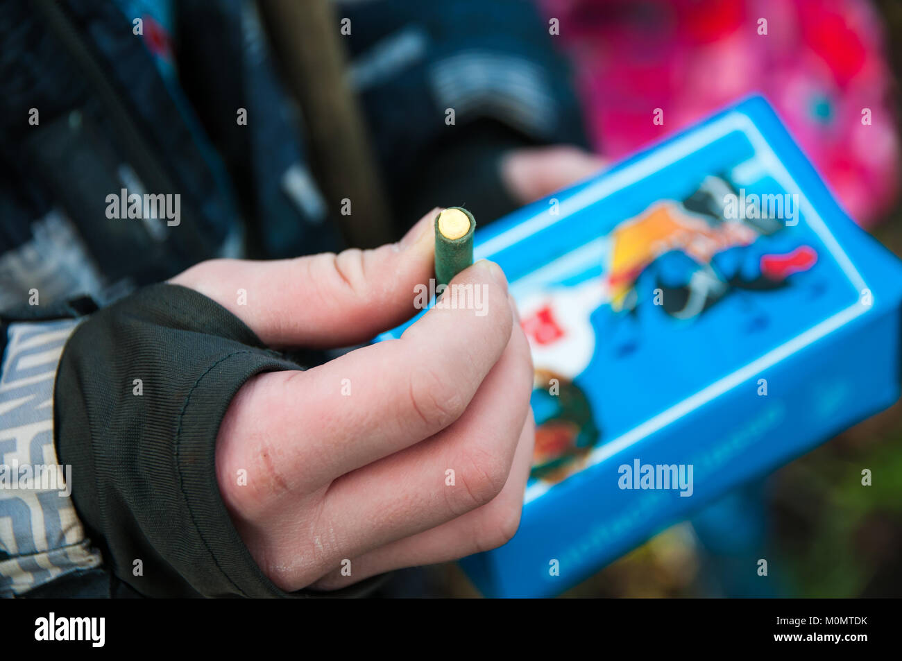 boy holding the hand of fireworks Stock Photo - Alamy