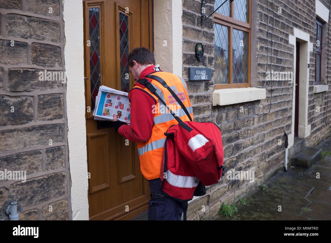 A postman on his round hi-res stock photography and images - Alamy