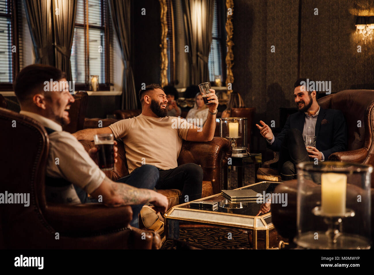 Night out men drinking beer hi-res stock photography and images - Alamy