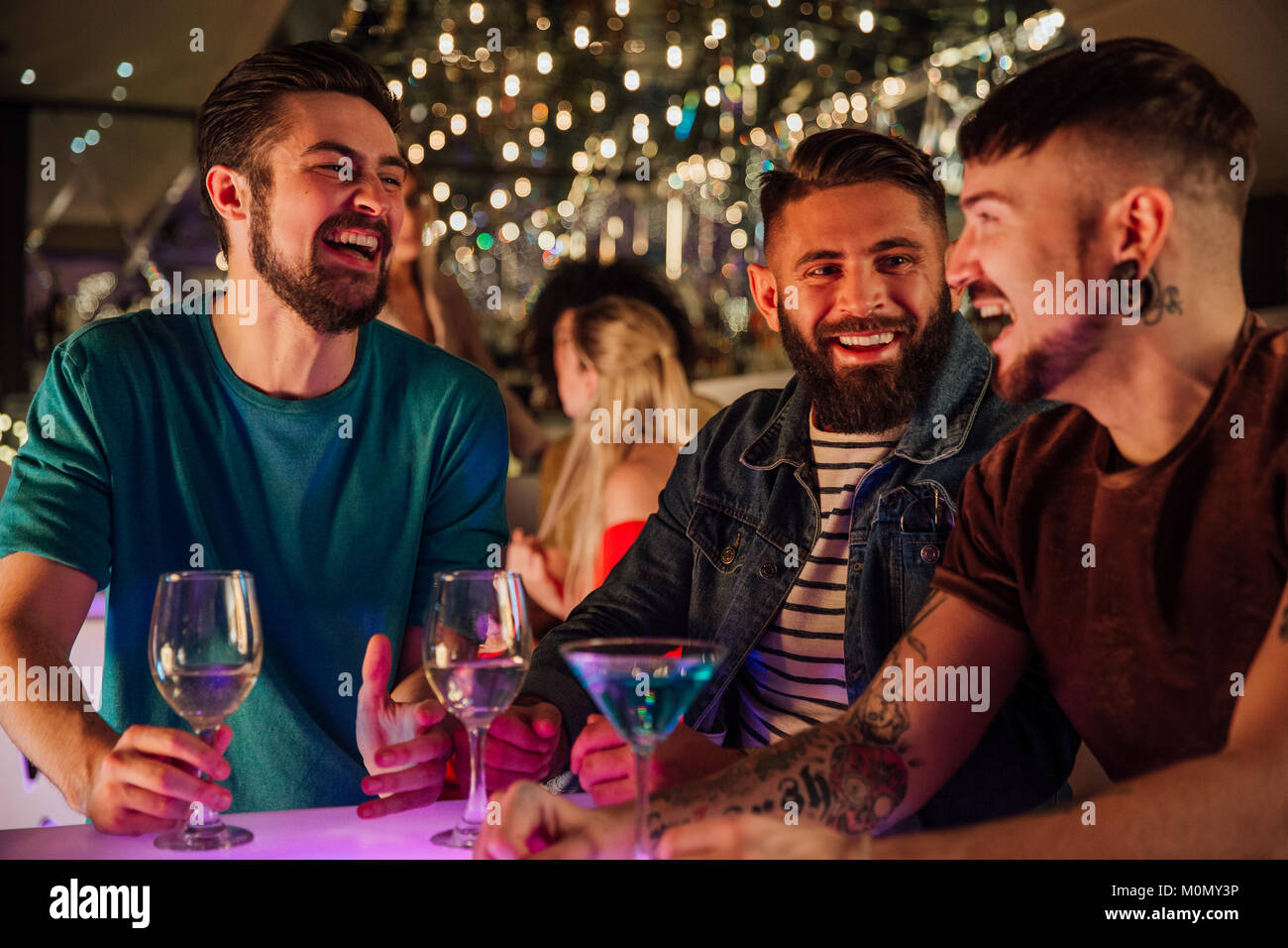 People talking at night club hi-res stock photography and images - Alamy