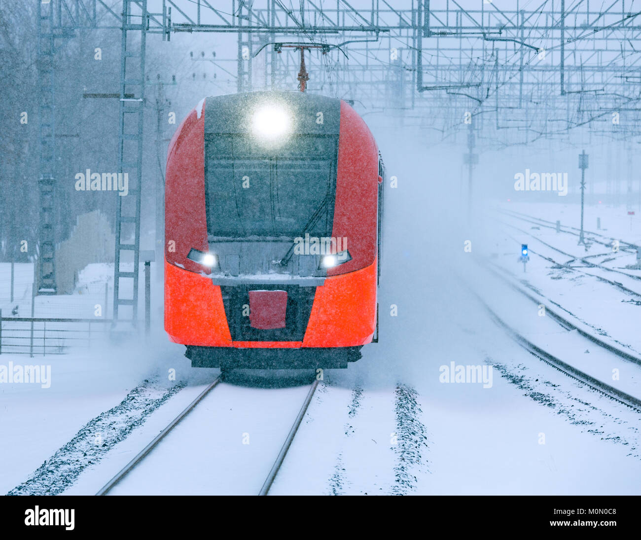 Highspeed train approaches to the station Stock Photo - Alamy