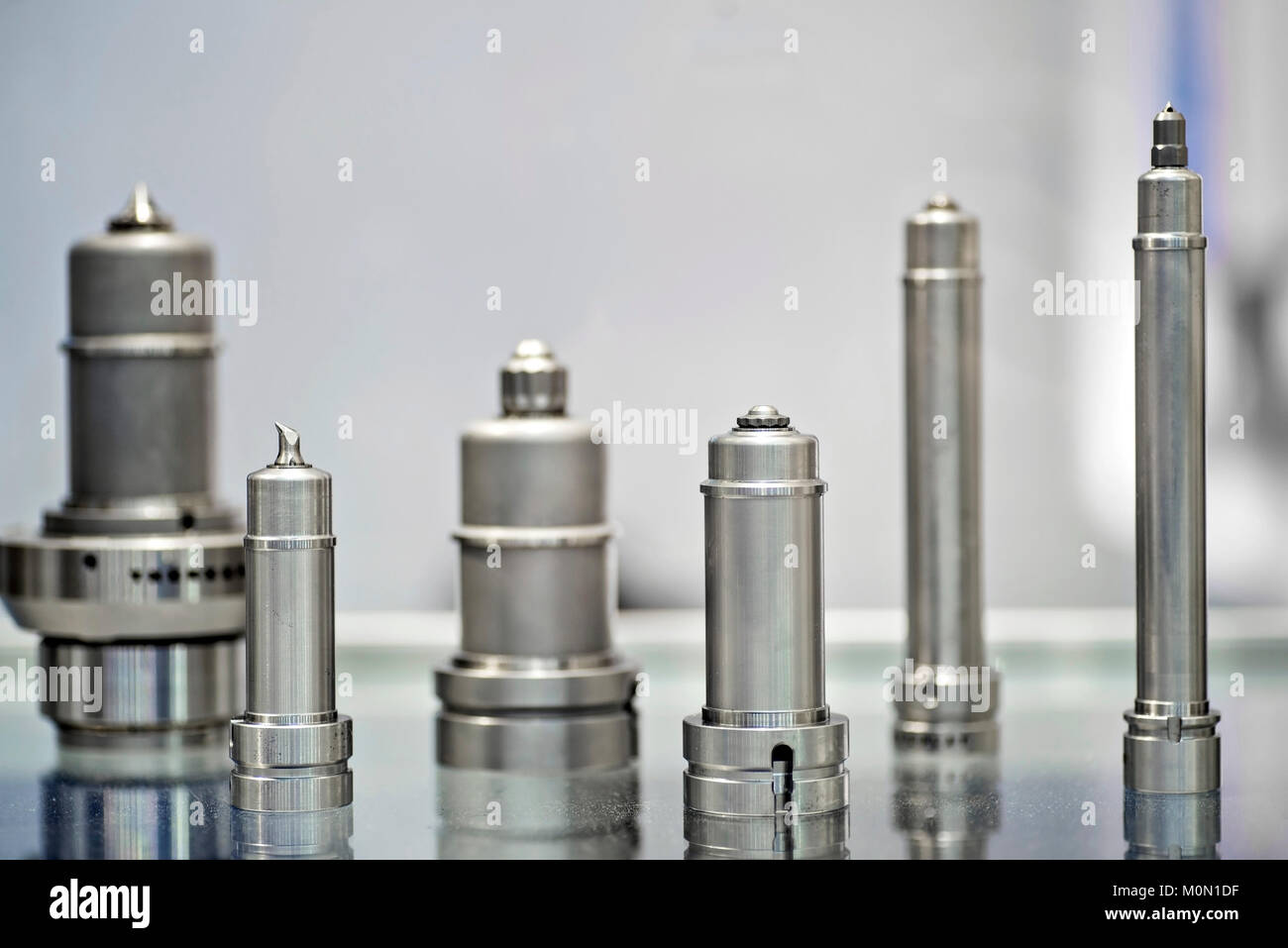 Metal mechanical industrial parts exhibited Stock Photo - Alamy