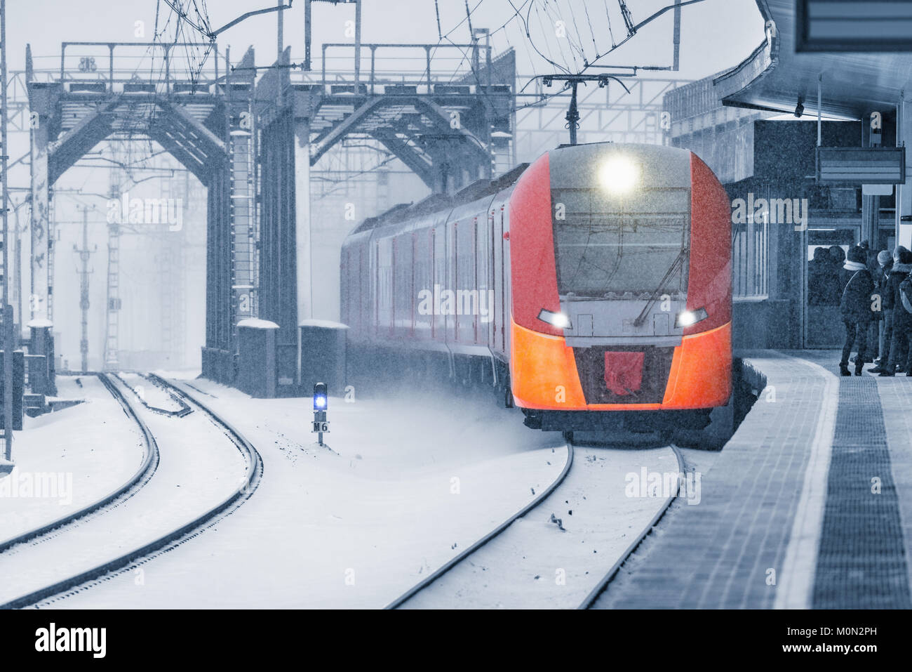 Highspeed train approaches to the station Stock Photo - Alamy