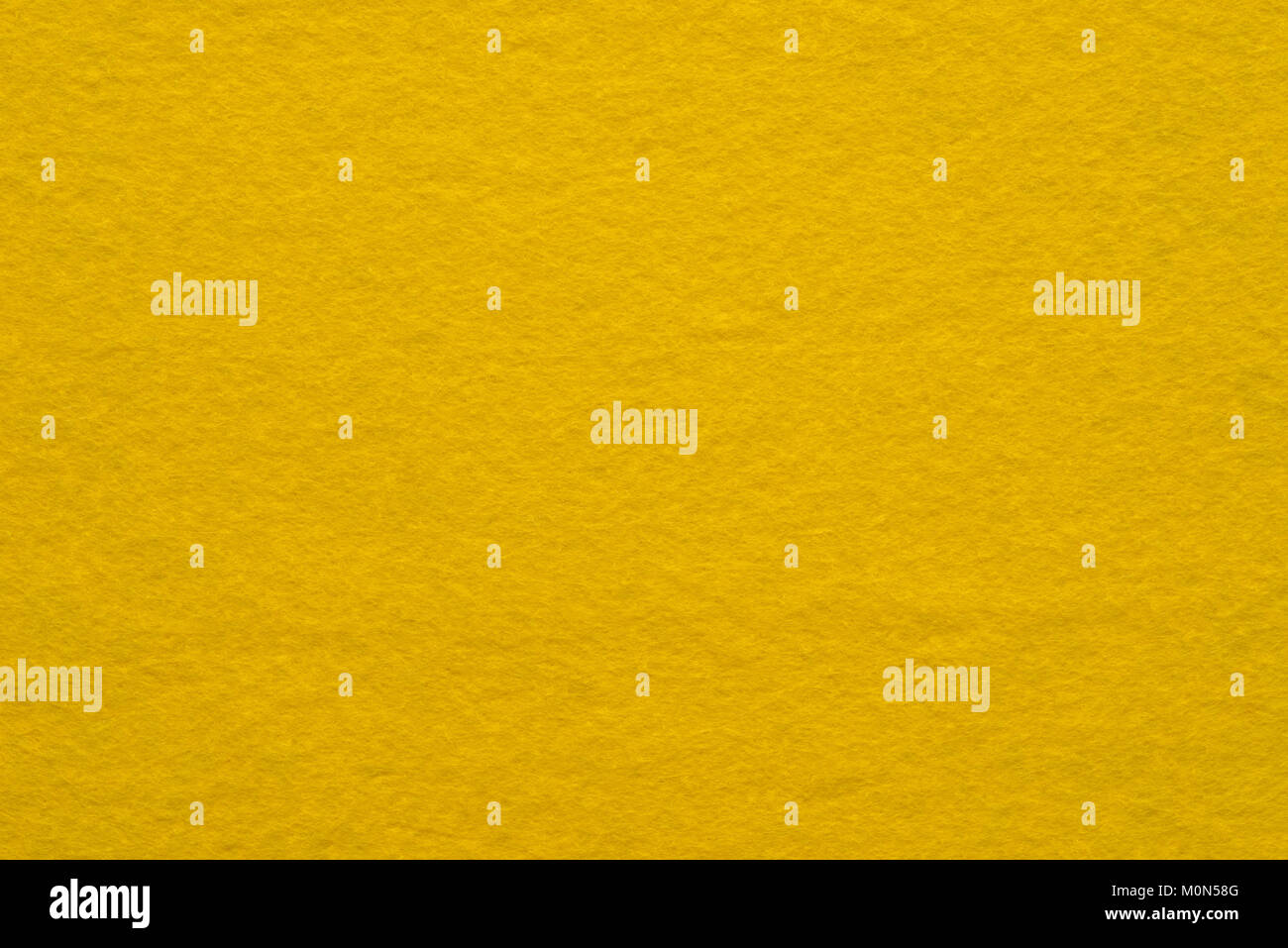 yellow color felt background texture Stock Photo - Alamy
