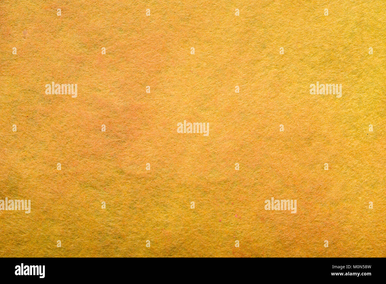yellow color felt background texture Stock Photo - Alamy