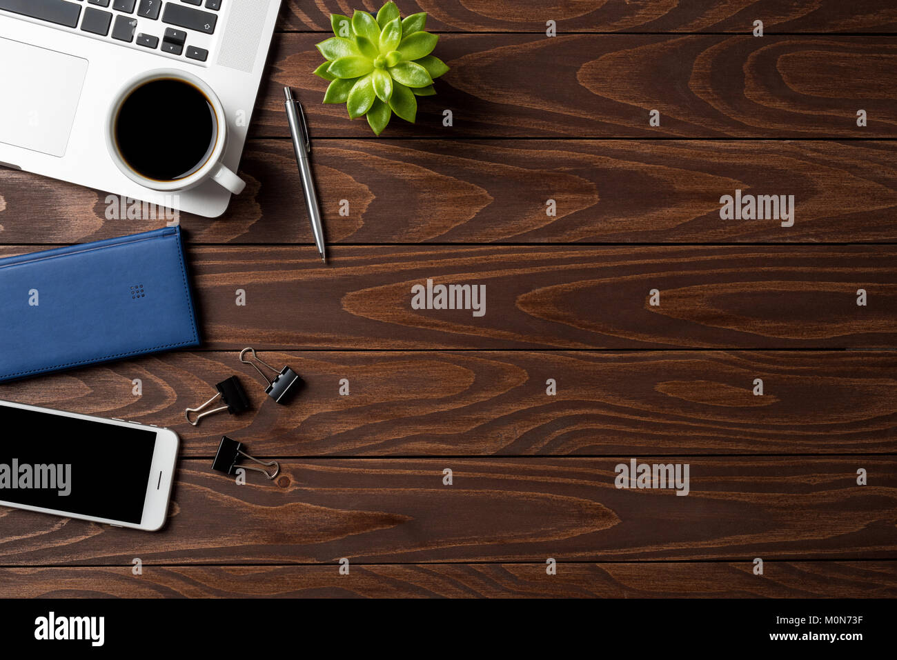 Overhead shot of office desktop with laptop Stock Photo - Alamy