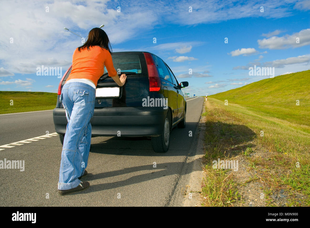 Pushing Cars High Resolution Stock Photography and Images - Alamy