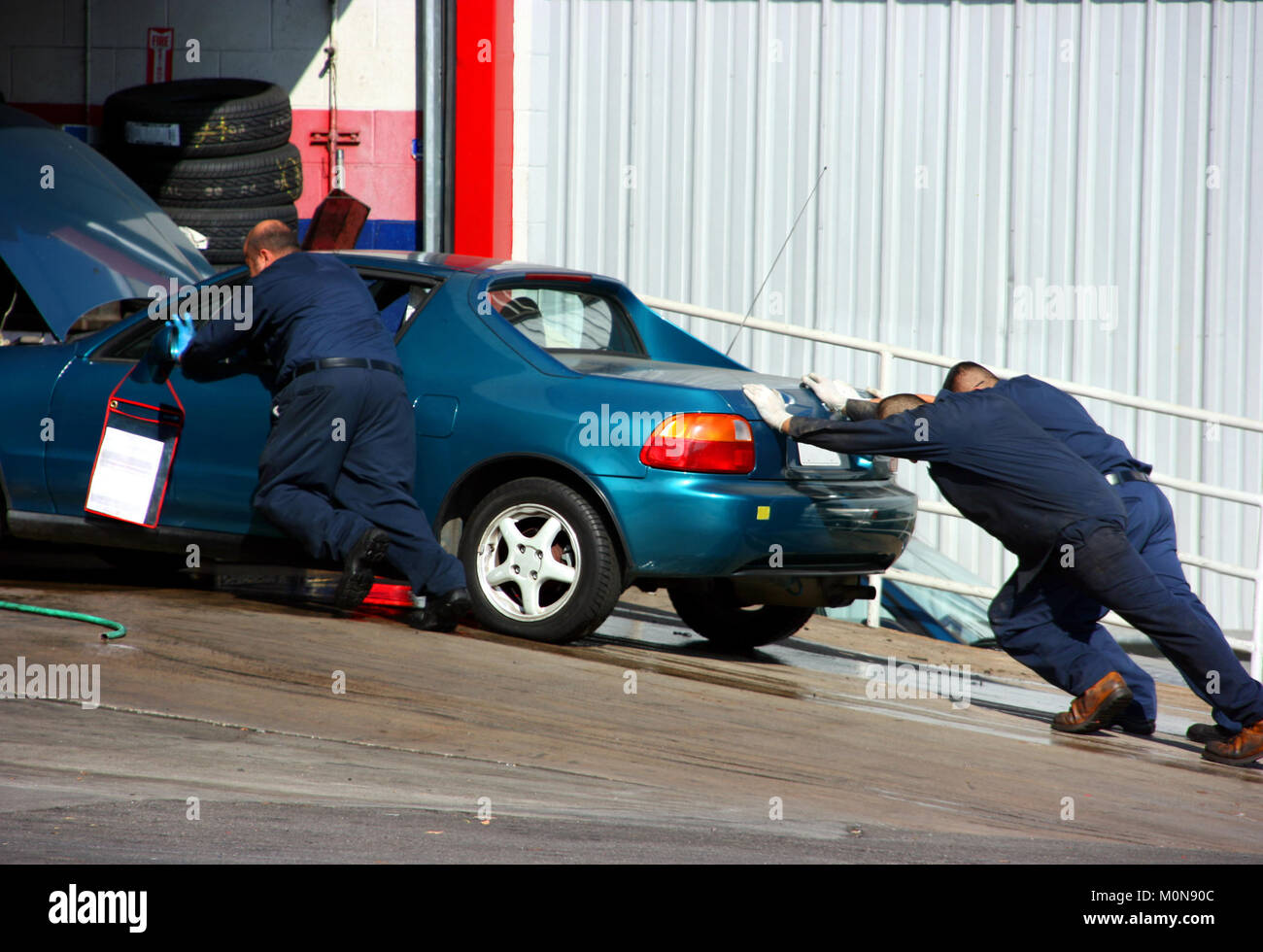 Pushing Cars High Resolution Stock Photography and Images - Alamy