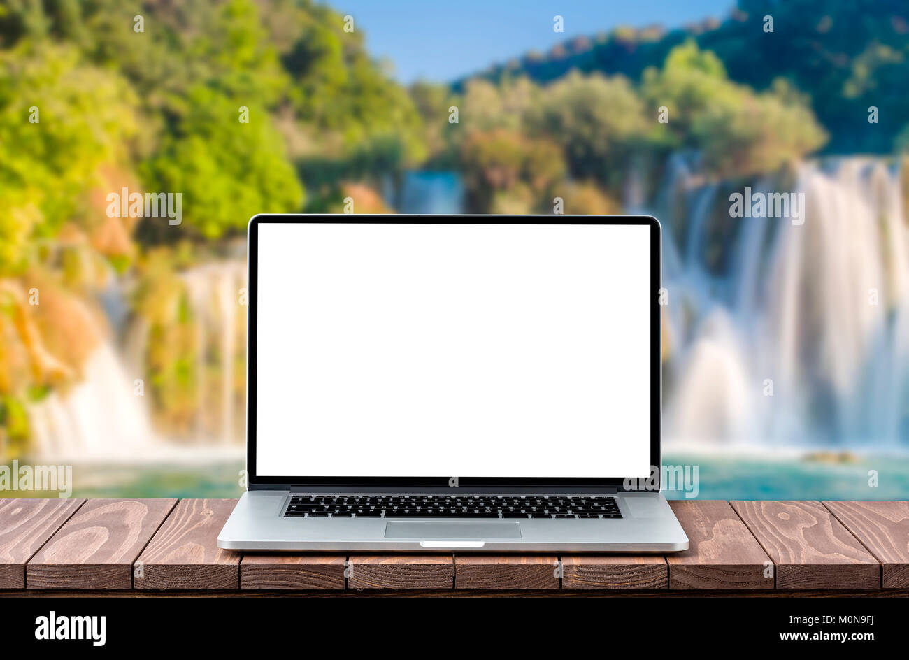 Modern laptop with empty white screen with landscape background Stock ...