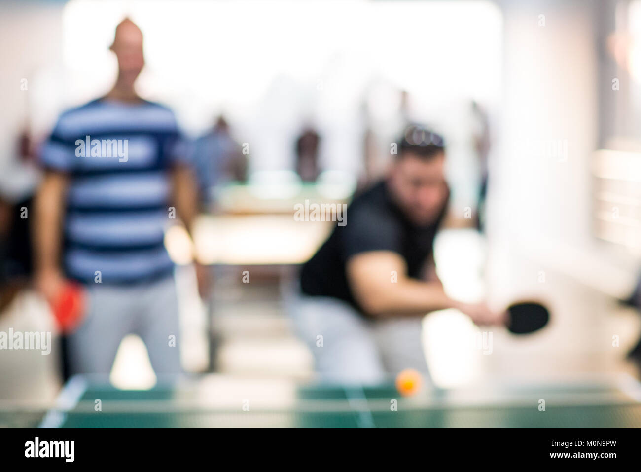 Men playing ping pong hi-res stock photography and images - Alamy