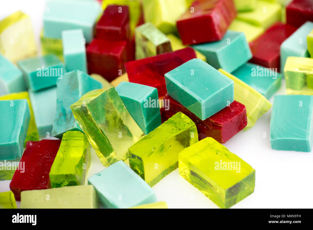 Stack of coloful glass mosaic tiles on white background Stock Photo - Alamy