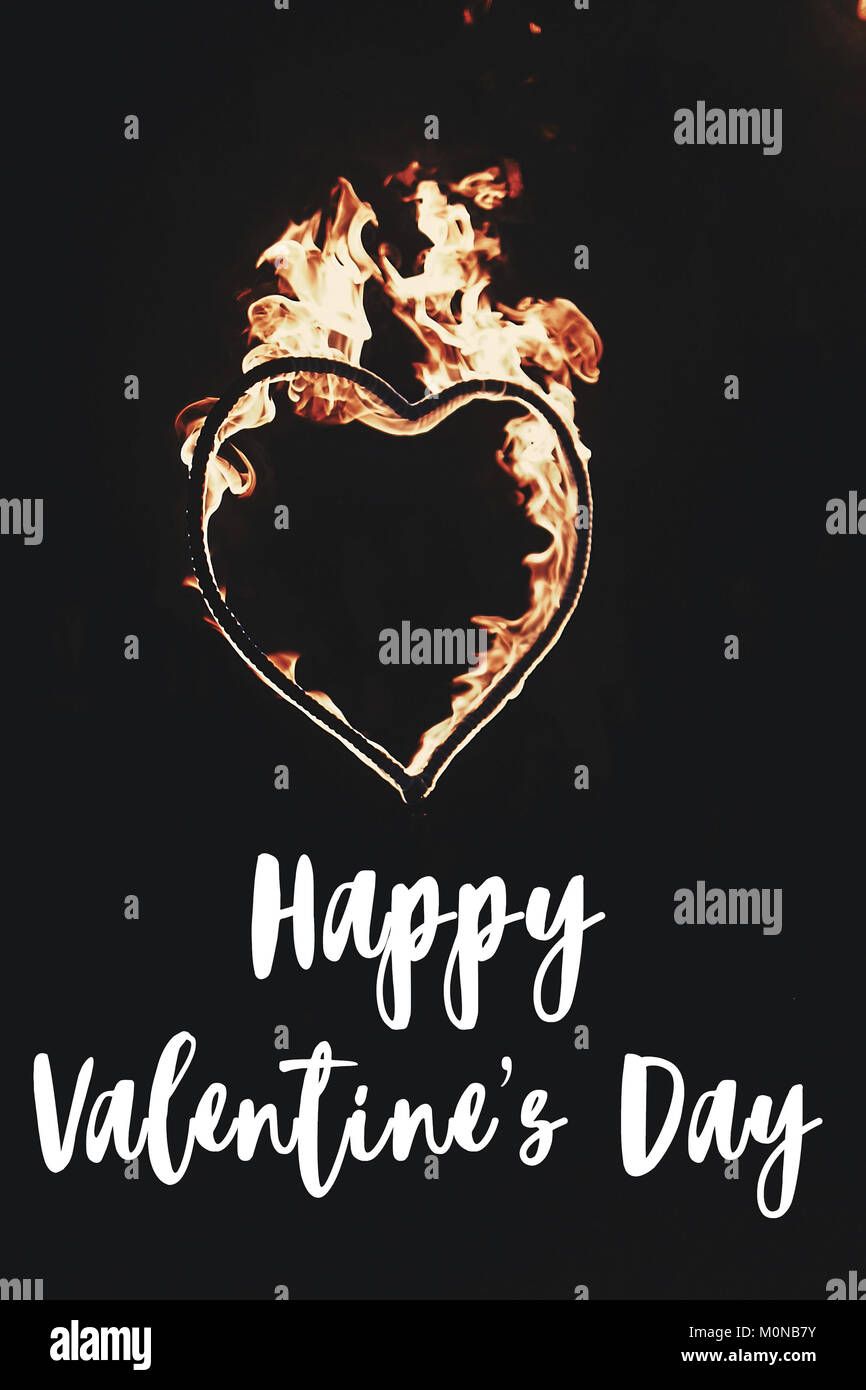 happy valentine's day text, greeting card. fire heart firework on black ...