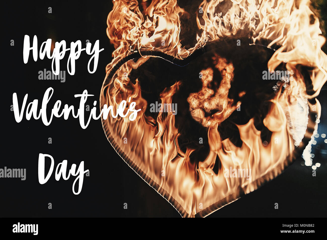 happy valentine's day text, greeting card. fire heart firework on black ...