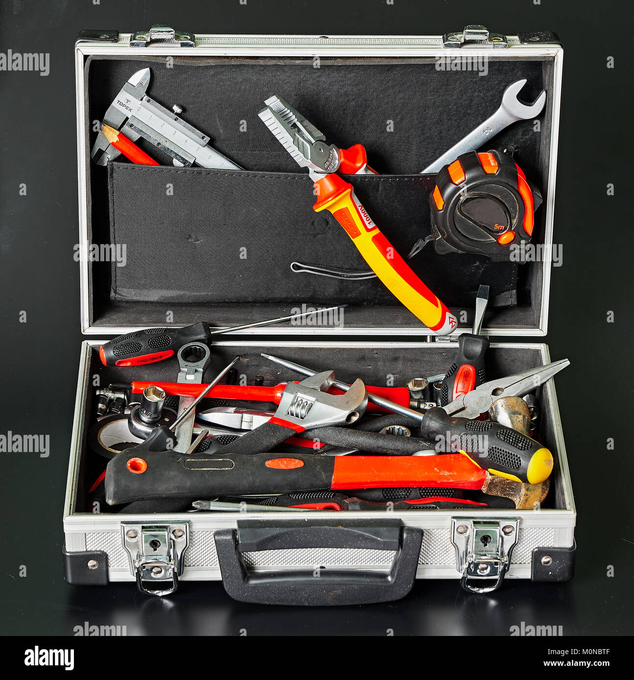 A set of various hand tools for DIY in a small suitcase Stock Photo - Alamy