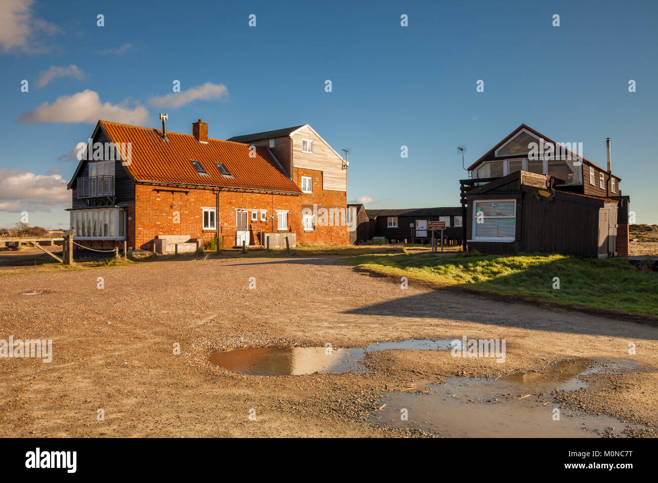 Timber buildings on the river, Walberswick, Suffolk UK Stock Photo - Alamy
