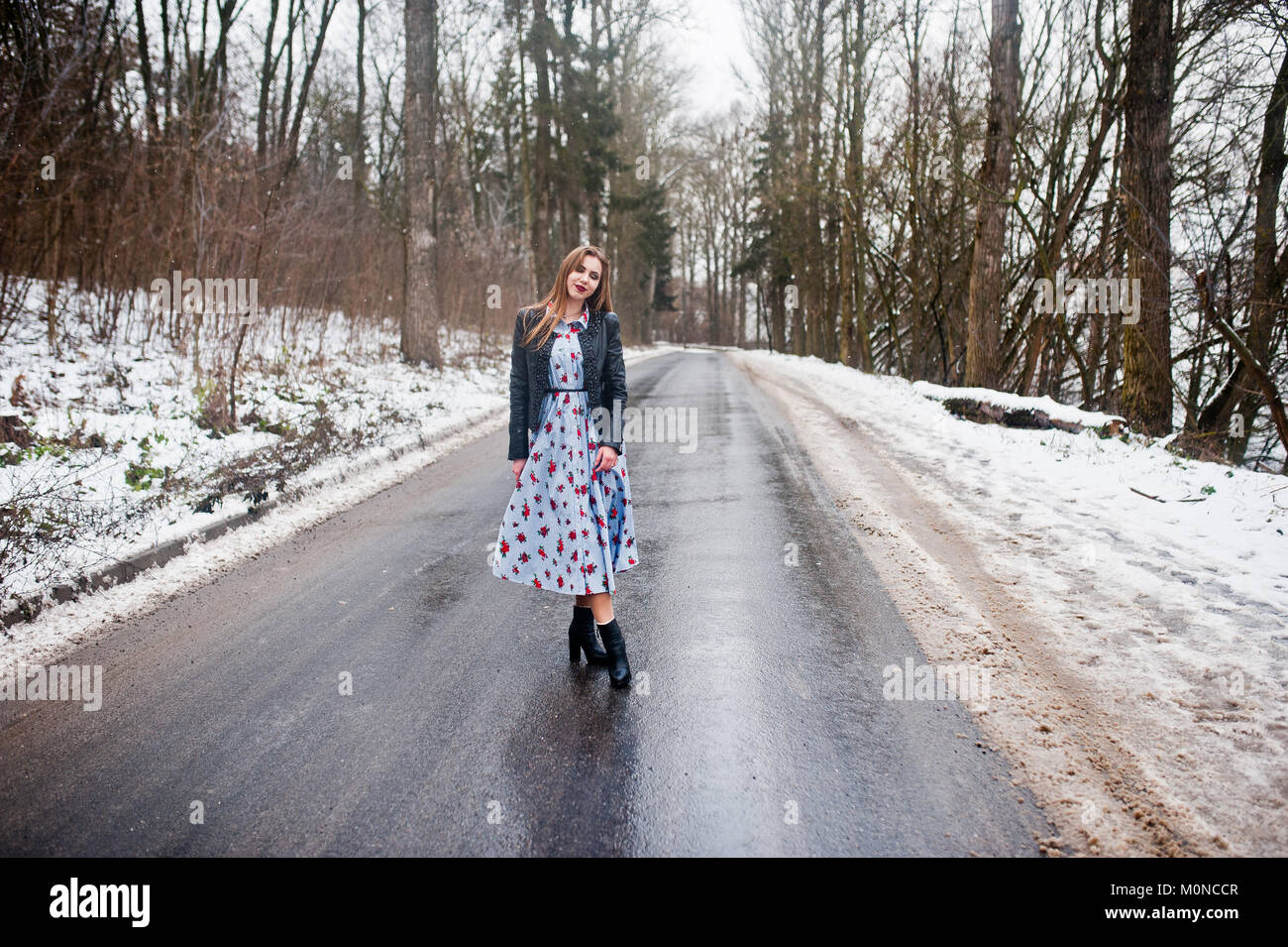 Stylish girl in leather jacket at winter day on road Stock Photo - Alamy