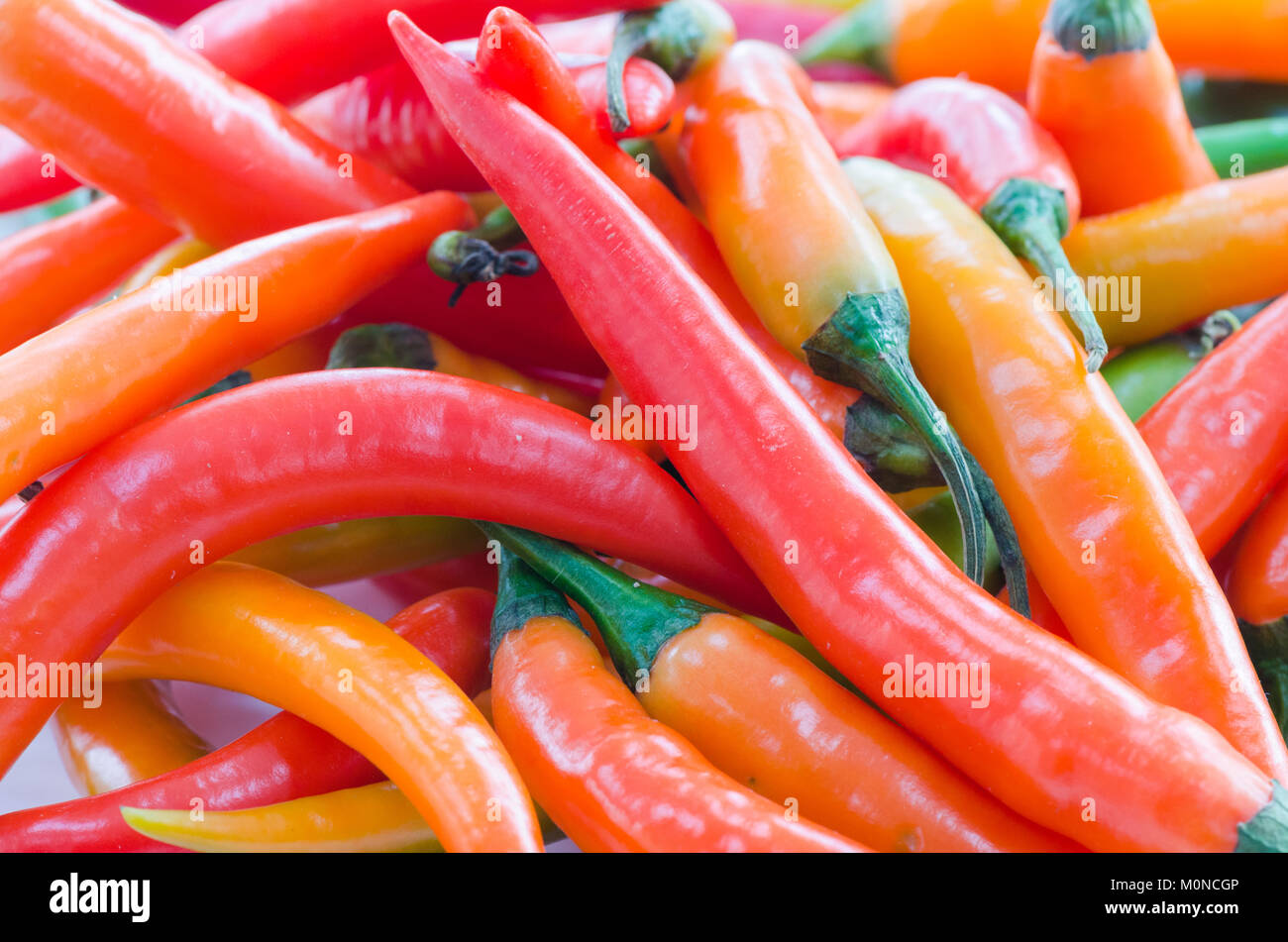 Orange chilli hi-res stock photography and images - Alamy