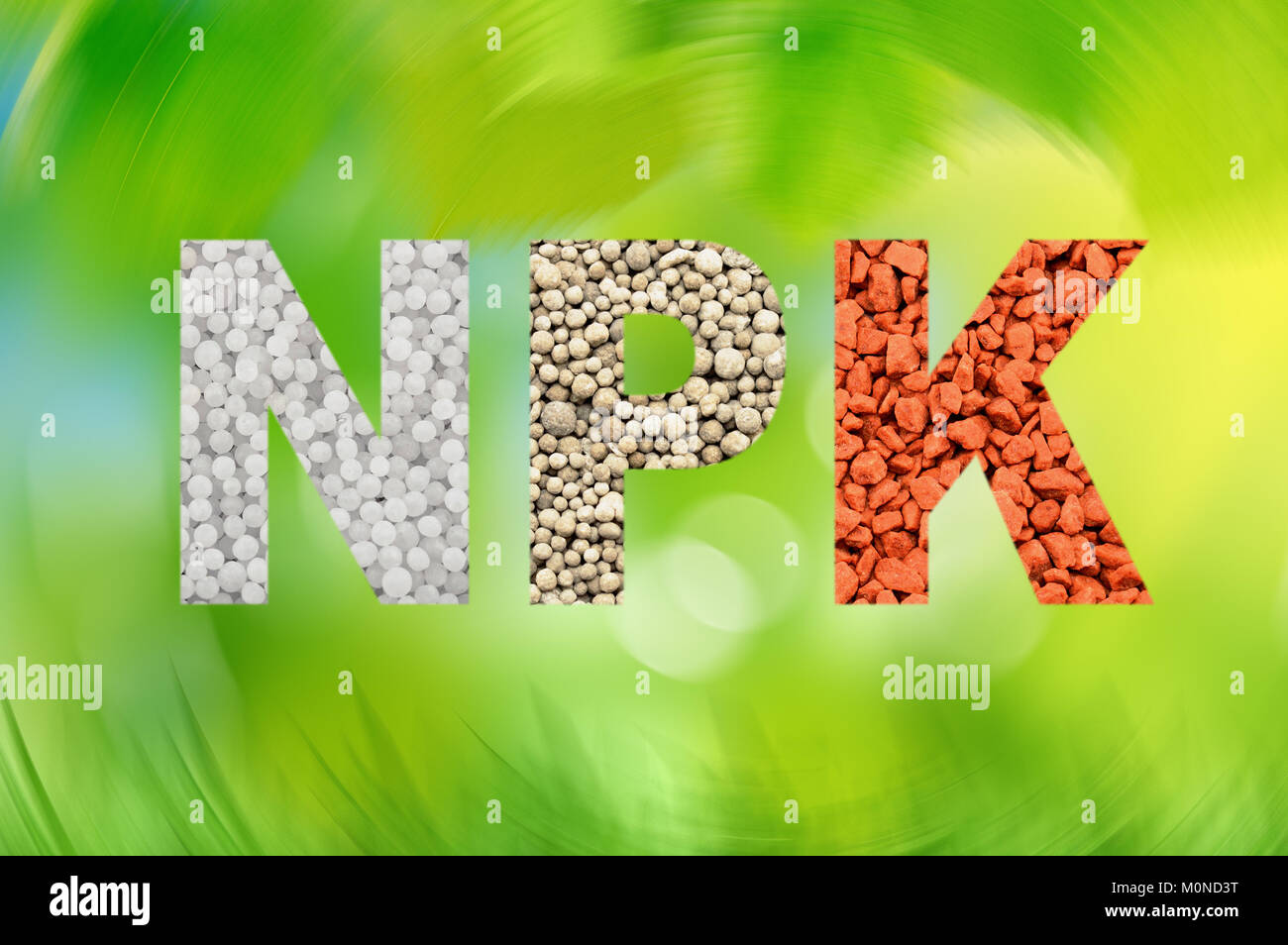 NPK letters made of mineral fertilizers on the white background. N ...