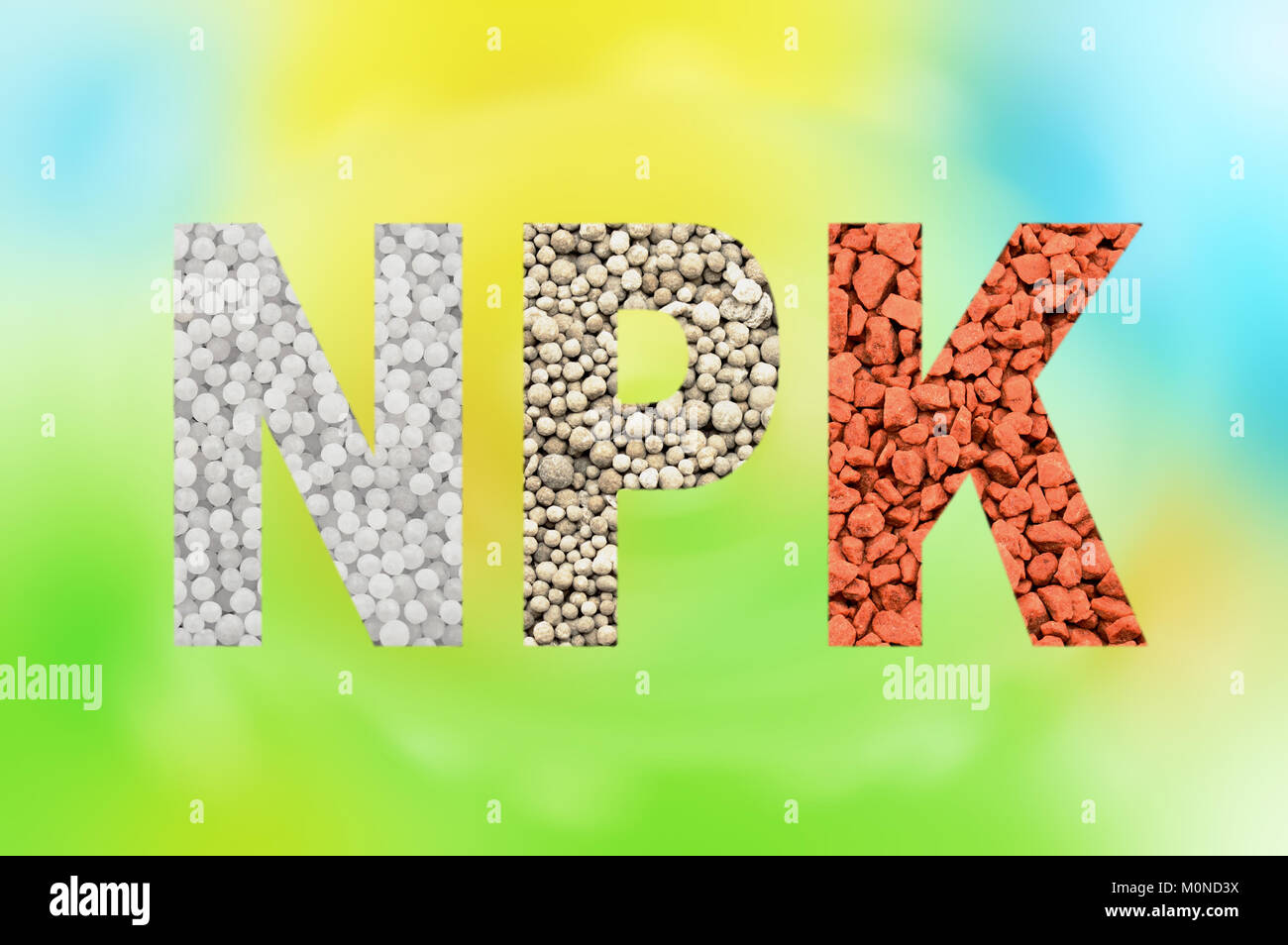 NPK letters made of mineral fertilizers on the white background. N ...