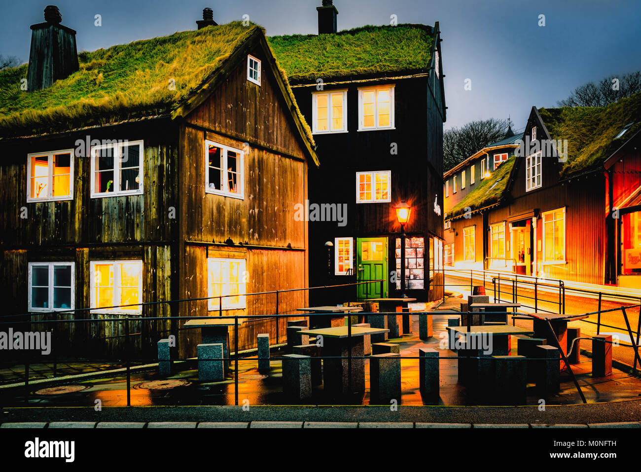 Traditional black tarred timber and grass roofs in Tórshavn Stock Photo ...