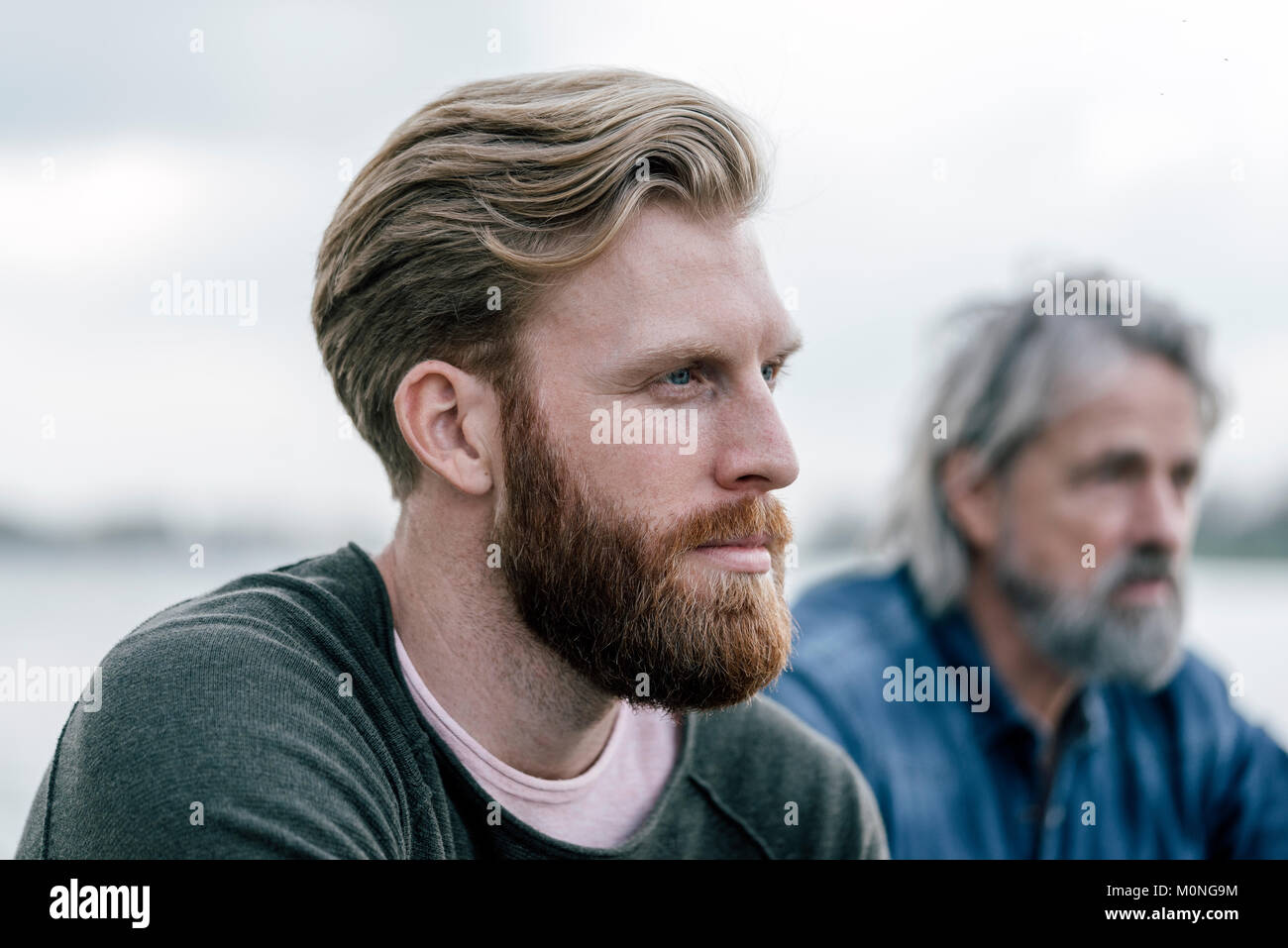 Father and son meeting outdoors, portrait Stock Photo - Alamy