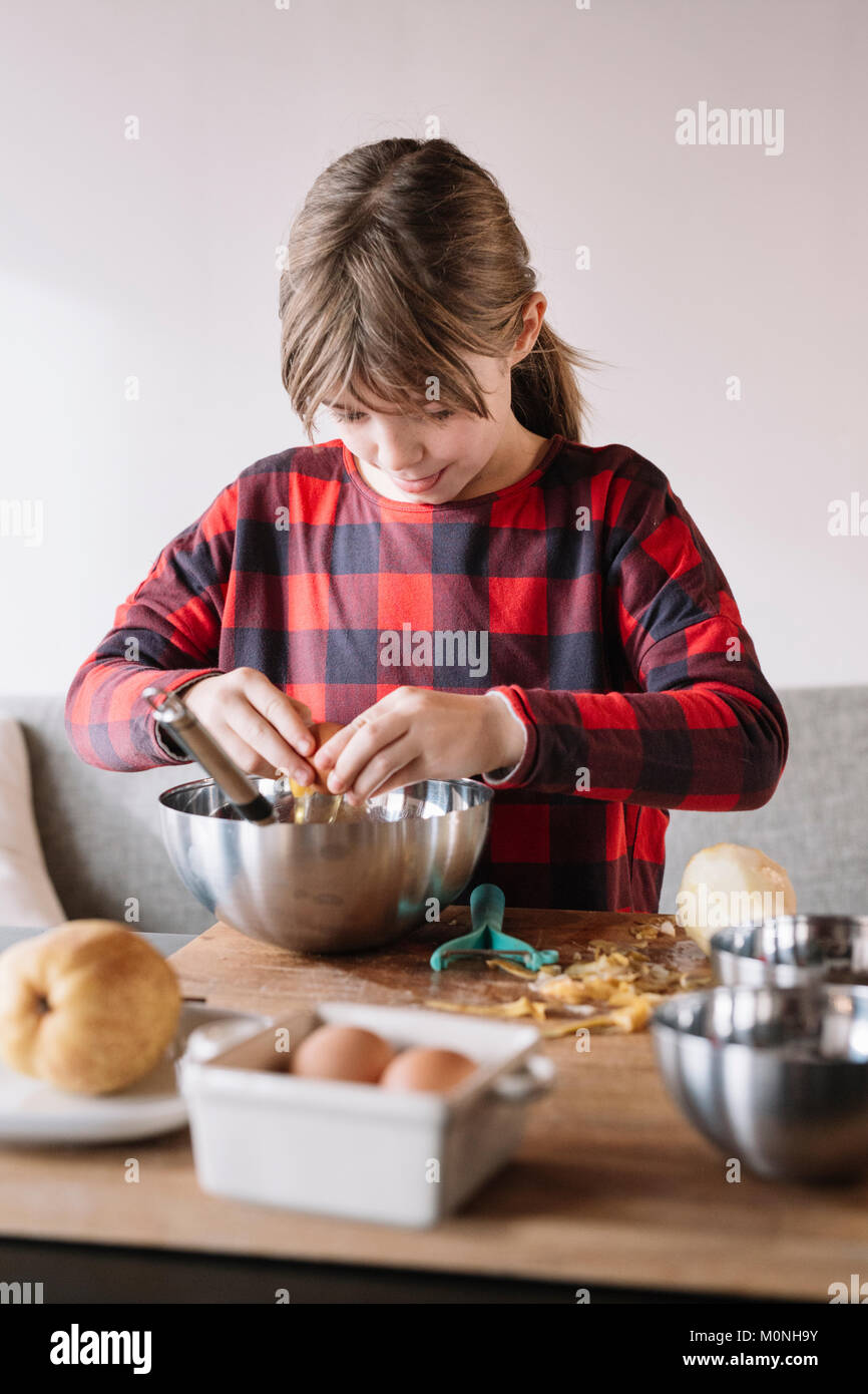 Girl preparing batter Stock Photo - Alamy