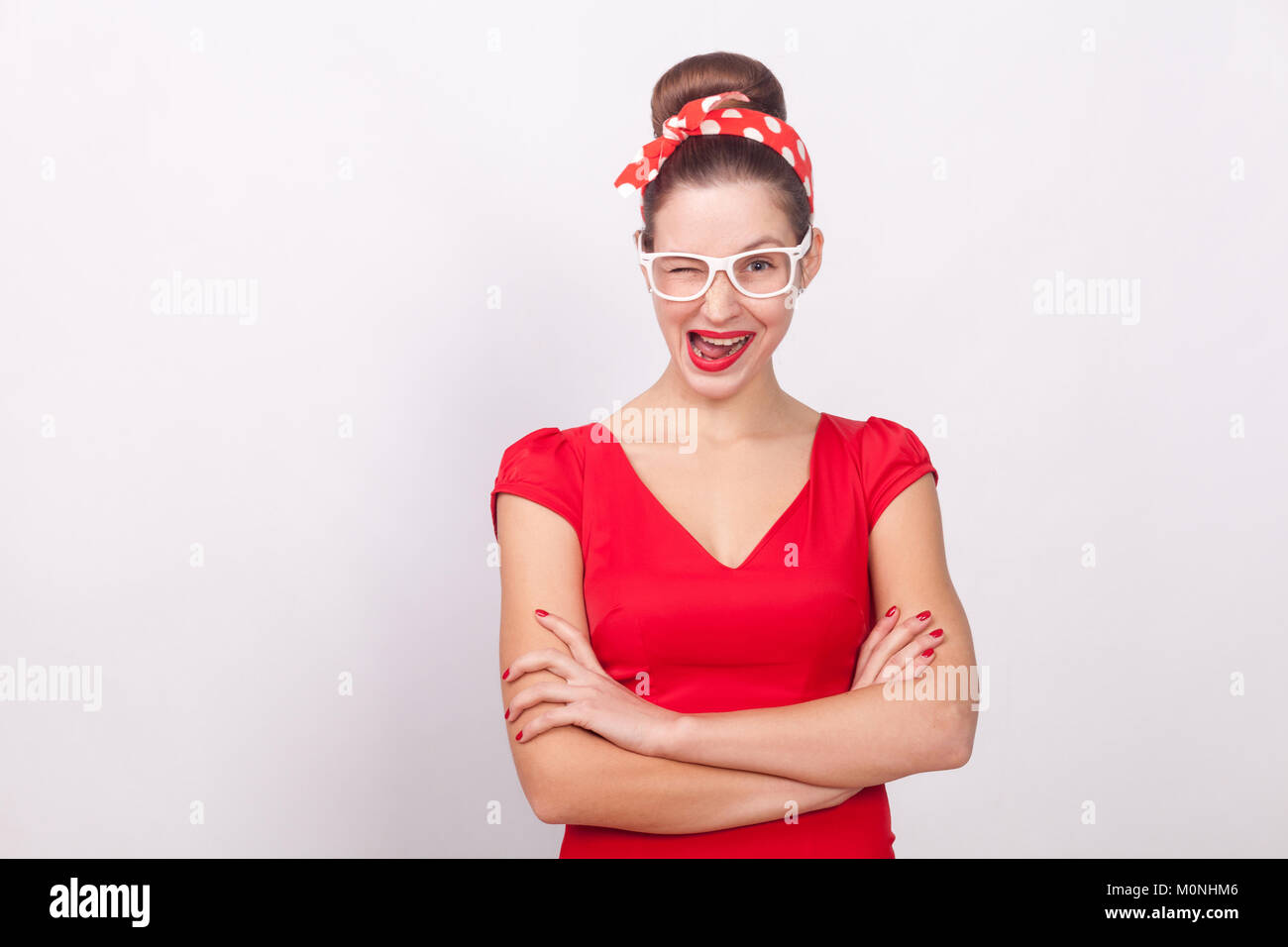 Woman wink glasses hi-res stock photography and images - Alamy