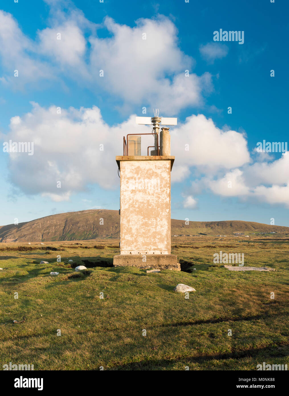 Lighthouse at Bloody Foreland, with Cnoc Fola (Knockfola, Hill of Blood ...