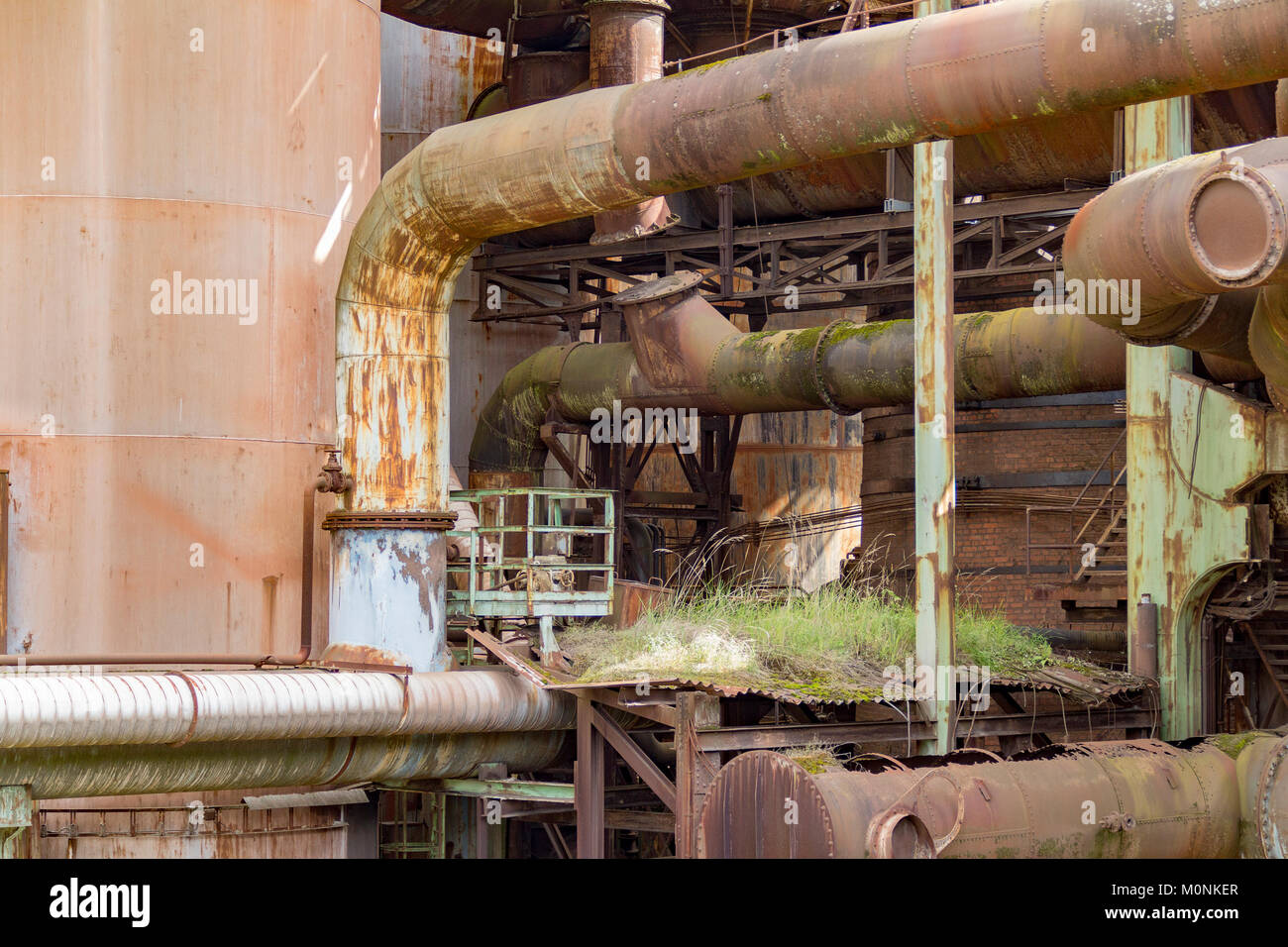 weathered rusty industrial scenery with old corroded steel girders and ...