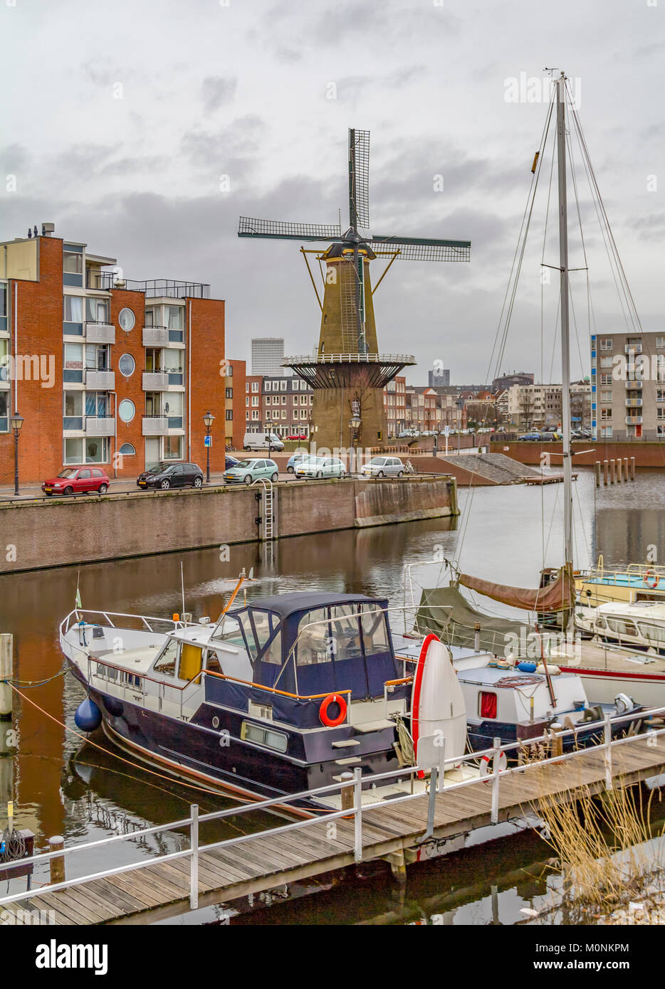 scenery with historic windmill around the Old Port in Rotterdam, a city ...